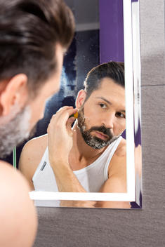 man with beard taking a shave - Stock Image - Everypixel