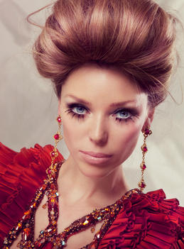 Studio fashion beauty portrait warm toned female model with blond hair ...