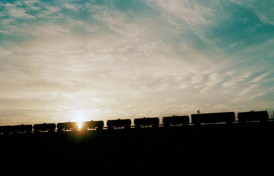 A cargo train moving through barren landscape in China - Stock Image ...
